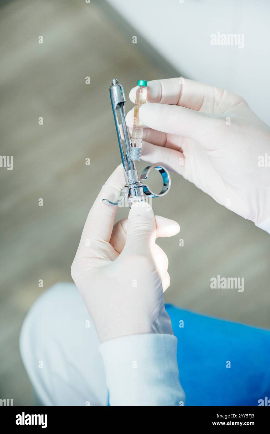 Doctor with syringe is preparing for injection. Medical concept Stock ...