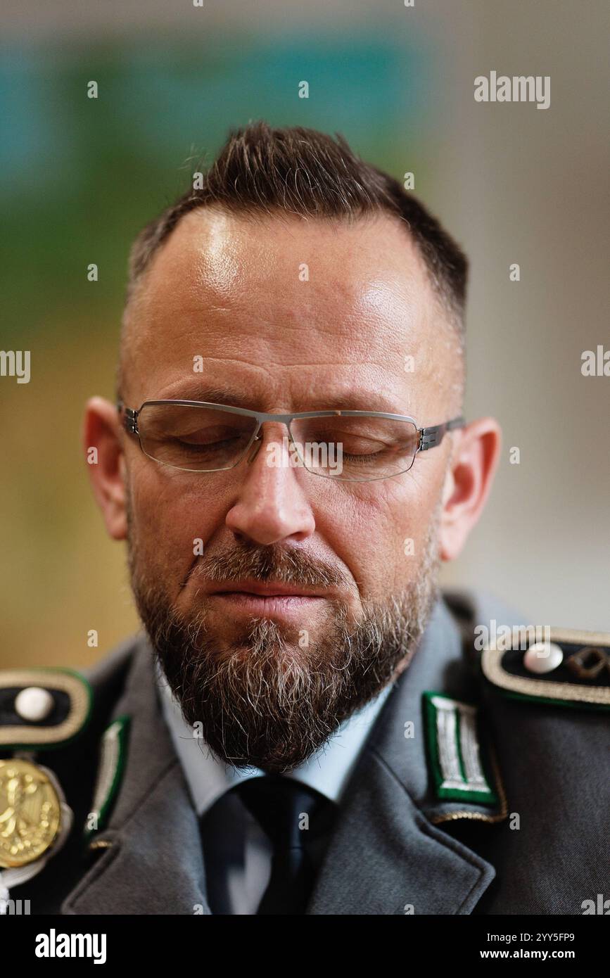 18 December 2024, Brandenburg, Strausberg: The recipient of the Cross ...