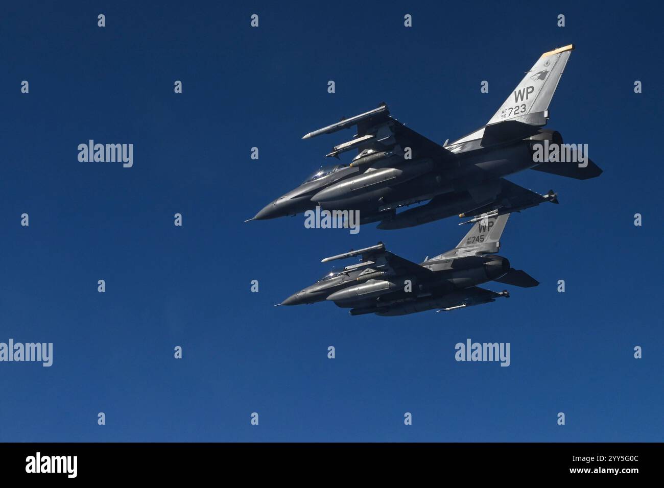Two U.S. Air Force F-16 Fighting Falcon aircraft assigned to the 80th ...