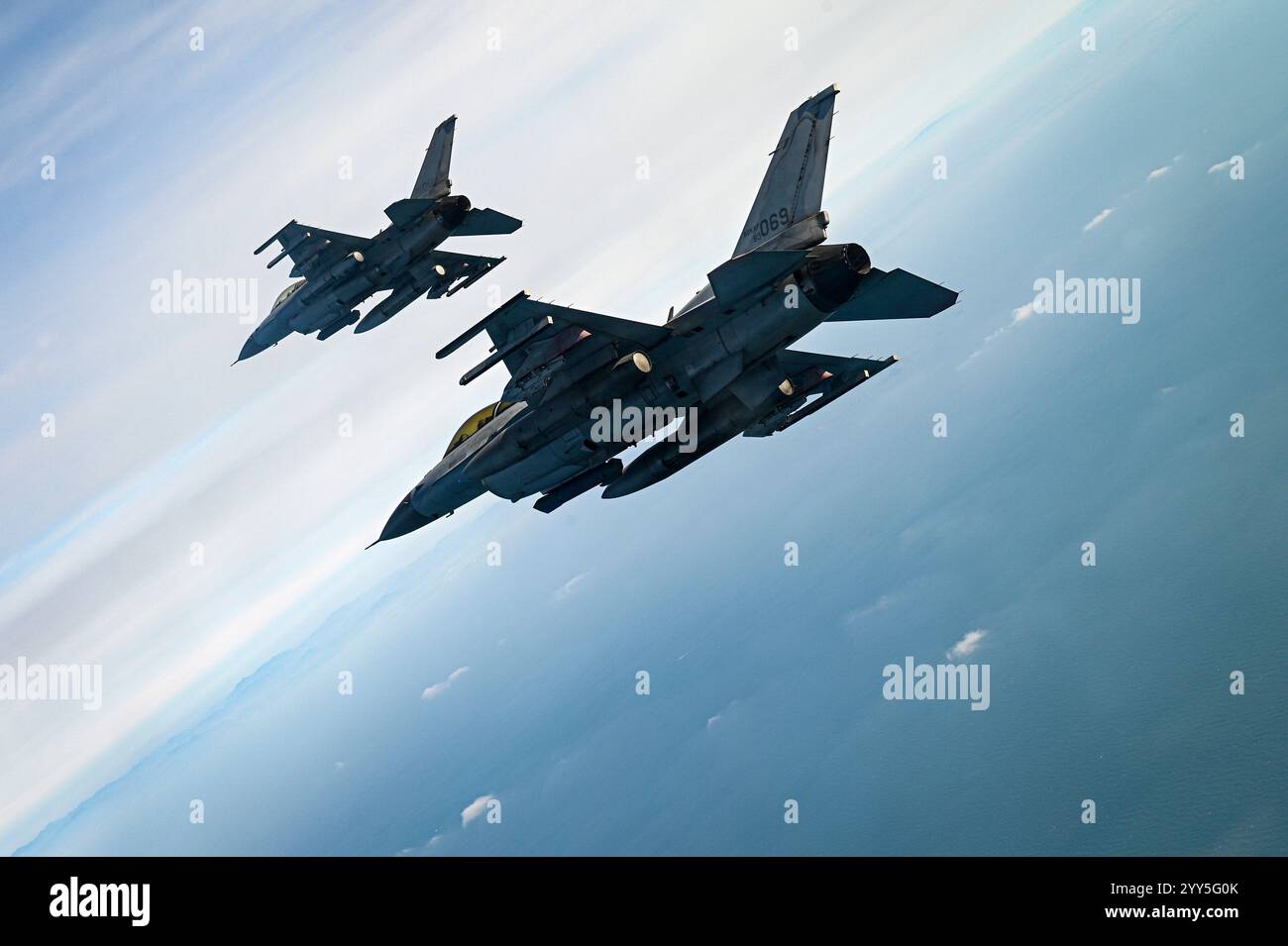 Two Republic of Korea Air Force KF-16 Fighting Falcon aircraft fly in ...
