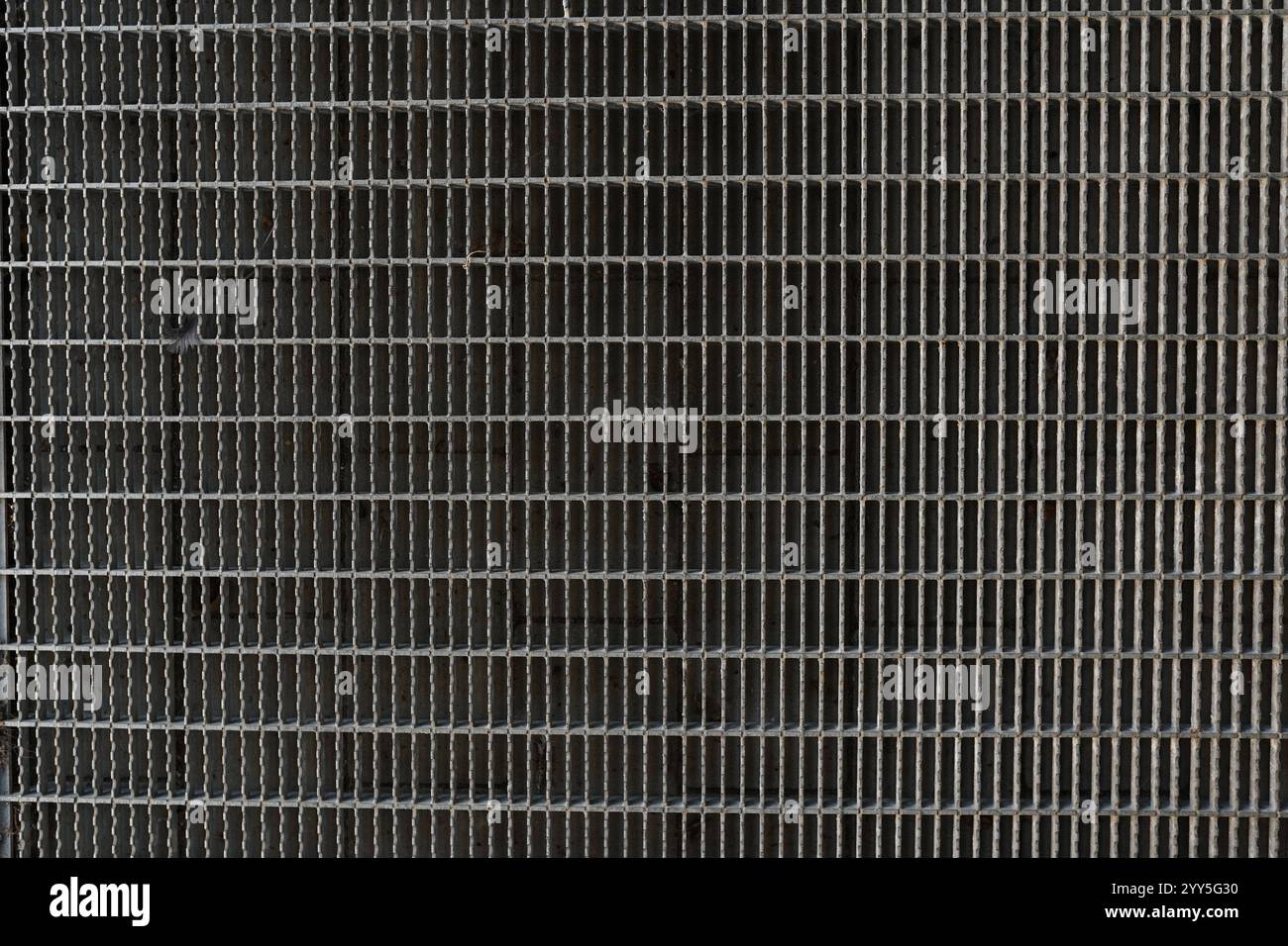 A background image of a gray steel grating panels Stock Photo - Alamy