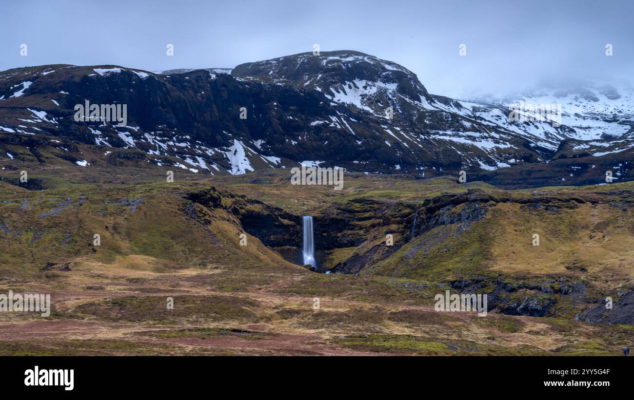 Random waterfall in Icleand shot at a distance to see the surrounding ...