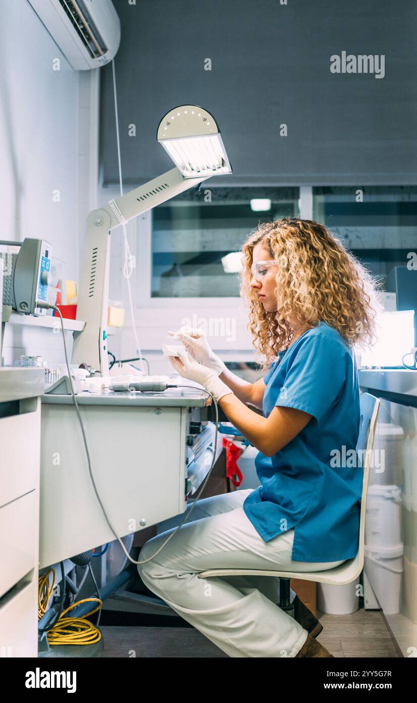 One day with dental female technican in his laboratory Stock Photo - Alamy