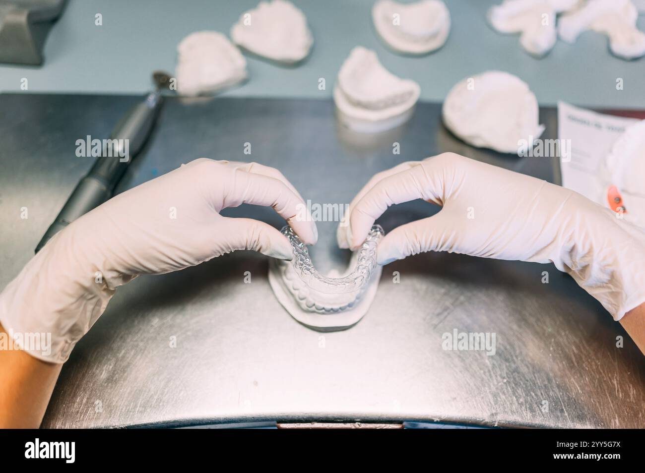 One day with dental female technican in his laboratory Stock Photo - Alamy