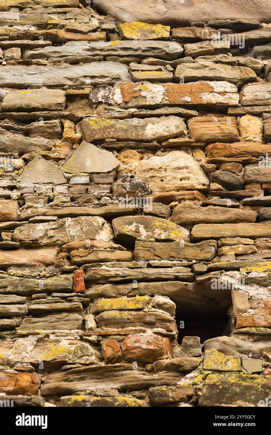 Striped and rectangular stone wall pattern, texture. Vertical photo ...