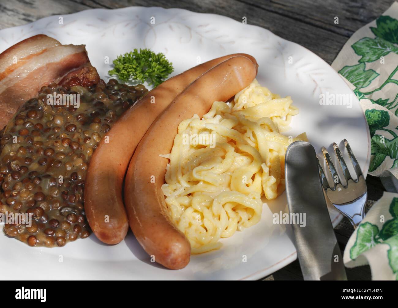 Swabian cuisine, lentils with spaetzle, pancetta and string sausages ...
