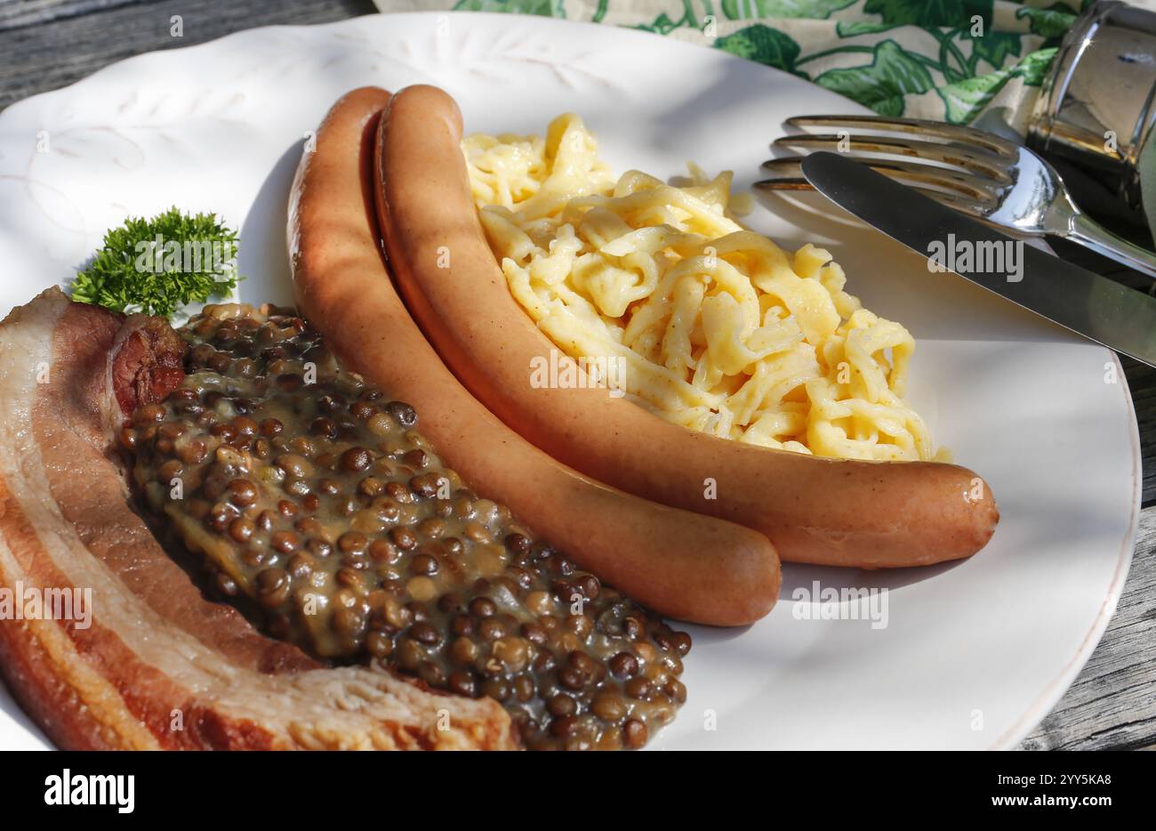 Swabian cuisine, lentils with spaetzle, pancetta and string sausages ...