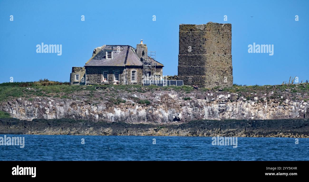 The Farne Islands are a group of islands off the coast of ...