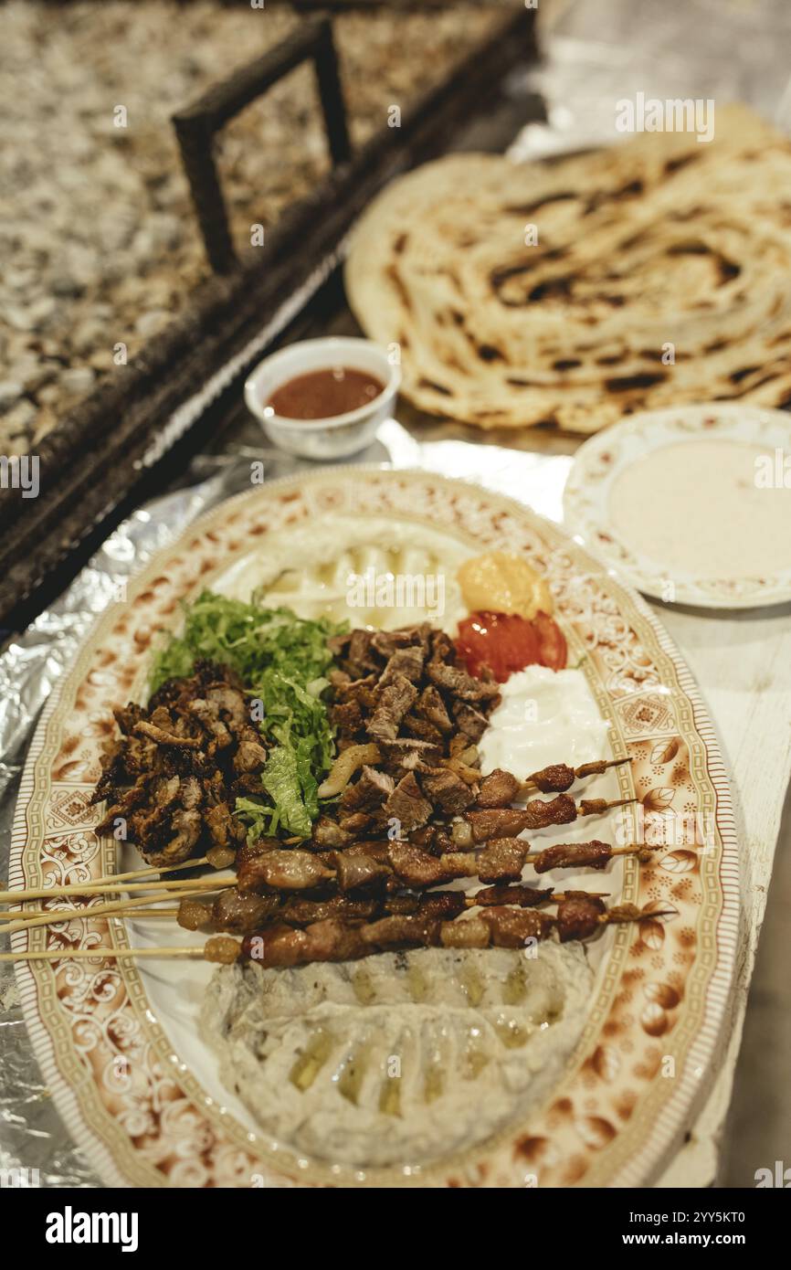 Shawarma, kebabs, hummus, muttabal, baba ghanoush, chutney, camel ...