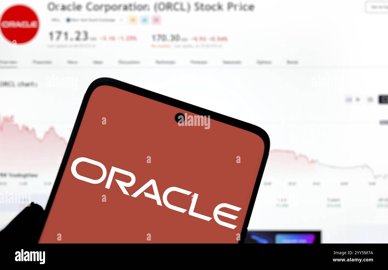 Oracle logo is diaplayed on smartphone. Oracle Corporation is an ...