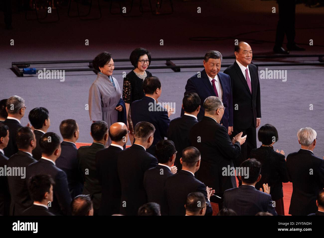 China's President Xi Jinping, background, second right, arrives with ...