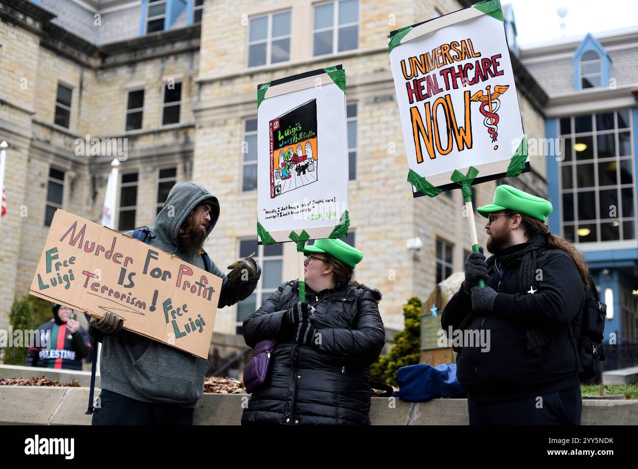 Adam Giesseman, left, of Piqua, Ohio, Ashlyn Adami, center, of South ...