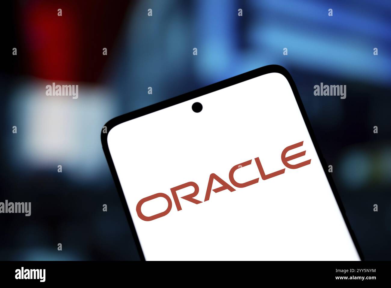 Oracle logo is diaplayed on smartphone. Oracle Corporation is an ...