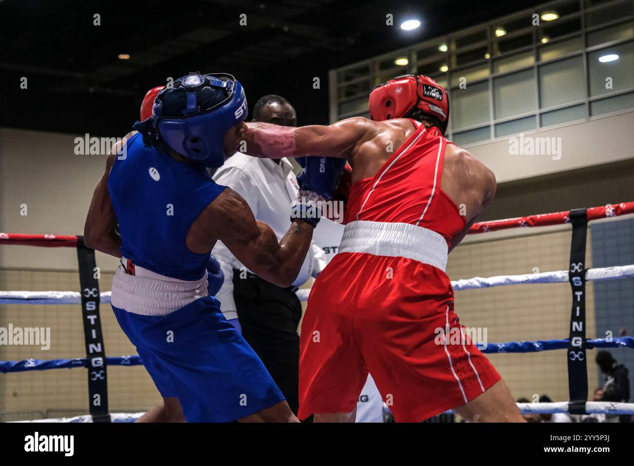 Richmond, Virginia, USA. 18th Dec, 2024. Thomas Covington (blue) lands ...