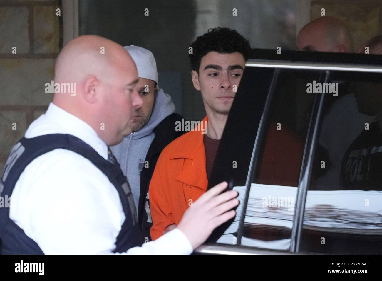 Luigi Nicholas Mangione leaves the Blair County Courthouse in ...