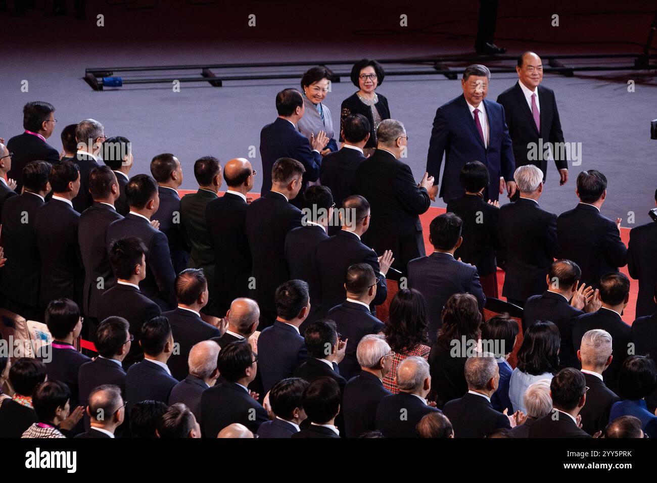 China's President Xi Jinping, background, second right, arrives with ...