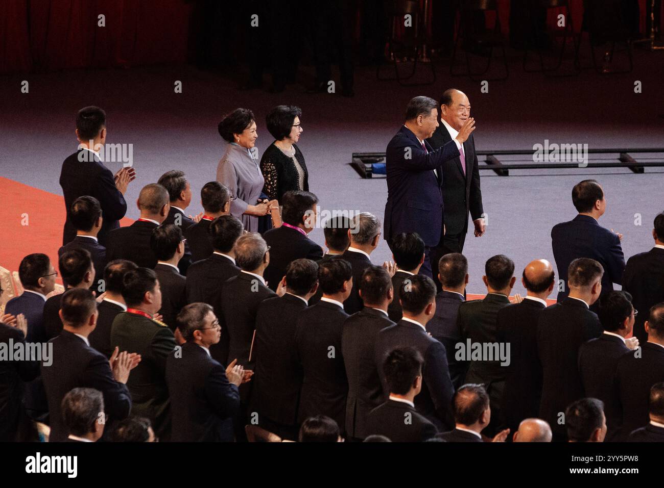 China's President Xi Jinping, background, second right, arrives with ...