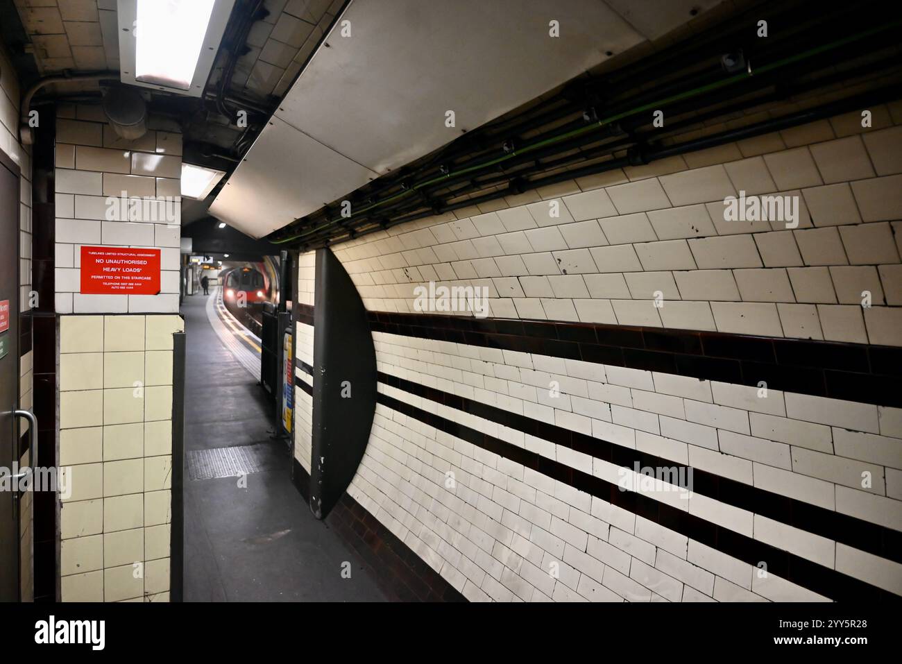 old tiled tunnels to the emergency exit at archway station london ...