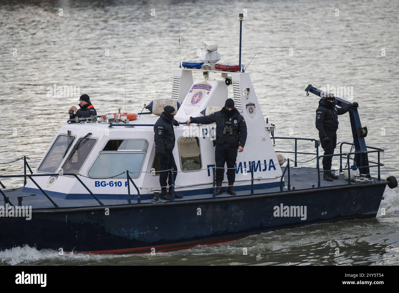 Police boat floating on water, armed soldiers, divers and lifeguards of ...