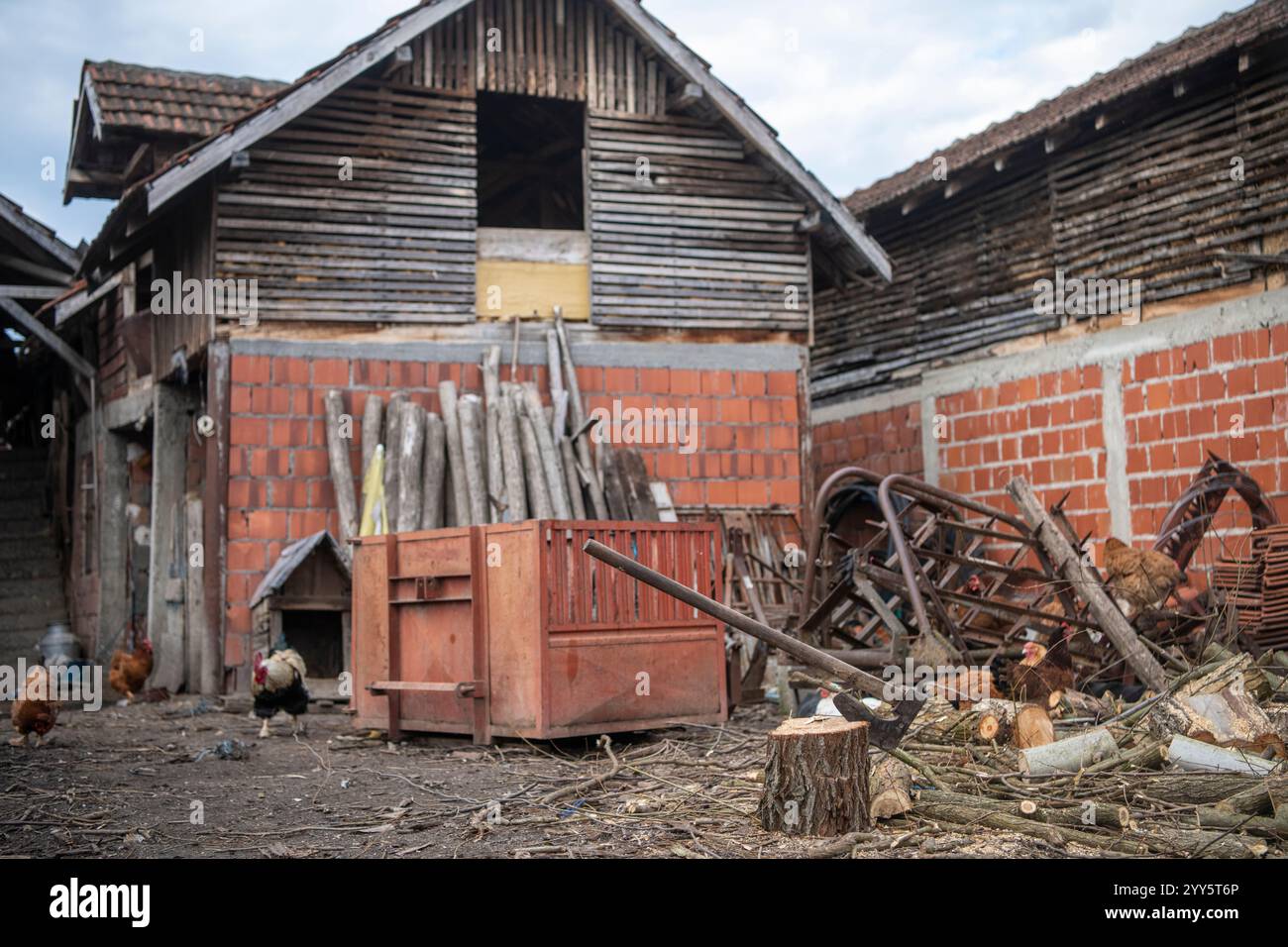 Traditional countryside storehouse building with chicken farm and wood ...