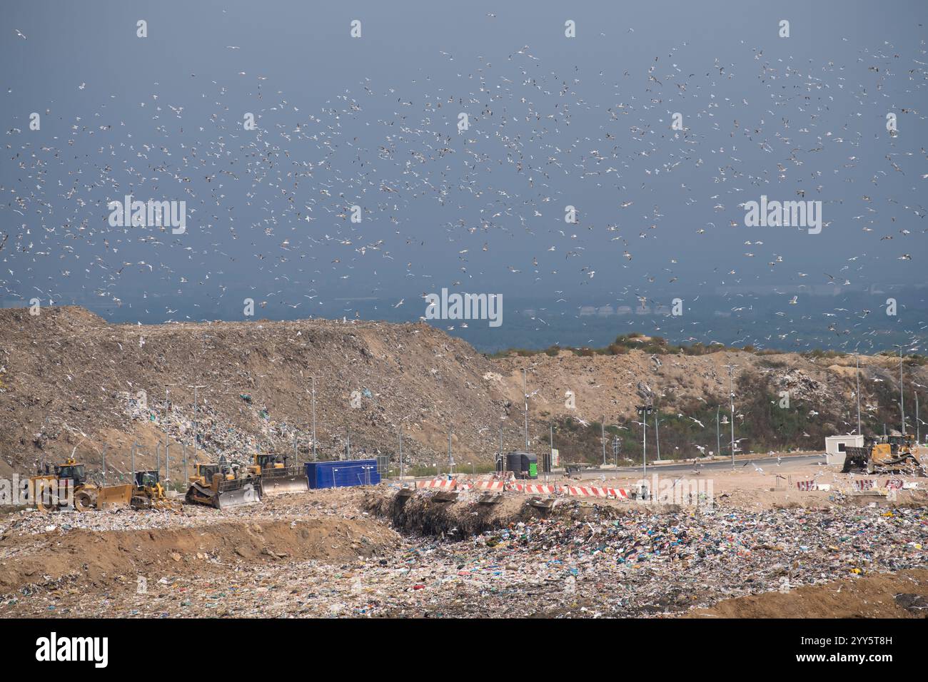 Dump trucks unloading garbage hi-res stock photography and images - Alamy