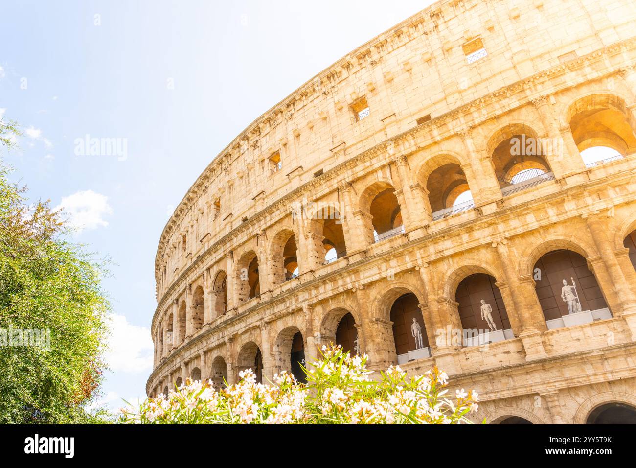 Visitors admire the stunning architecture of the Colosseum in Rome ...