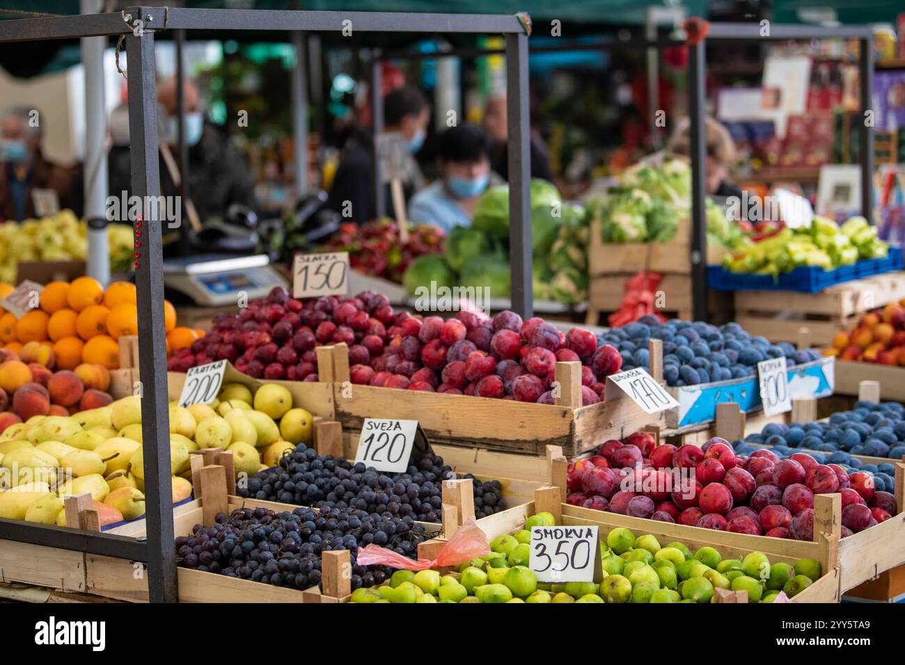 Open air street market (pijaca) with freshly harvested fruit in ...