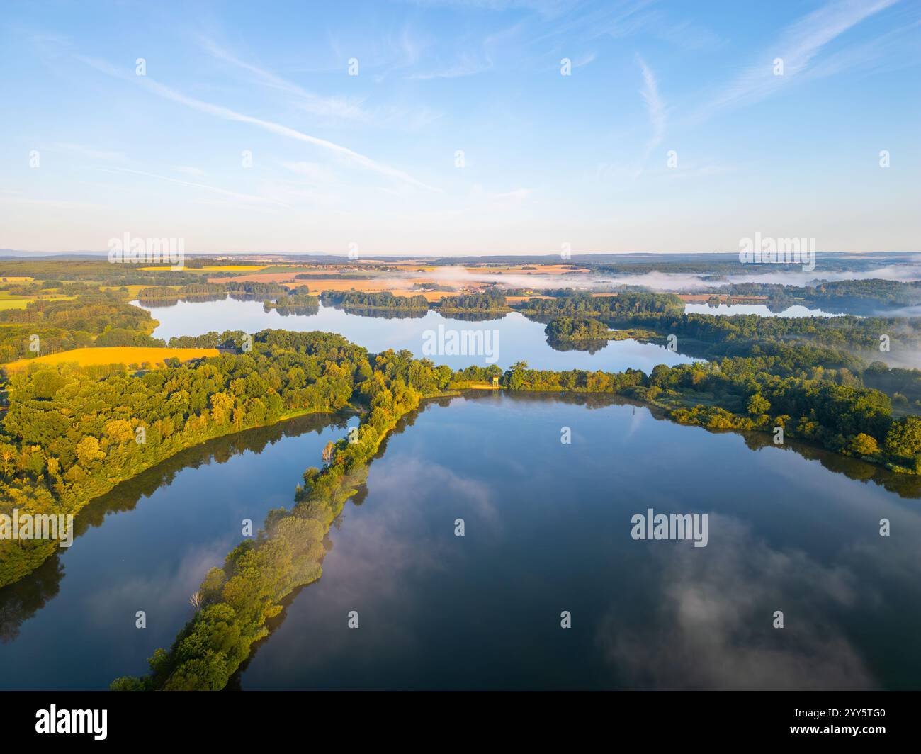 Tranquil pond reflects lush hi-res stock photography and images - Alamy