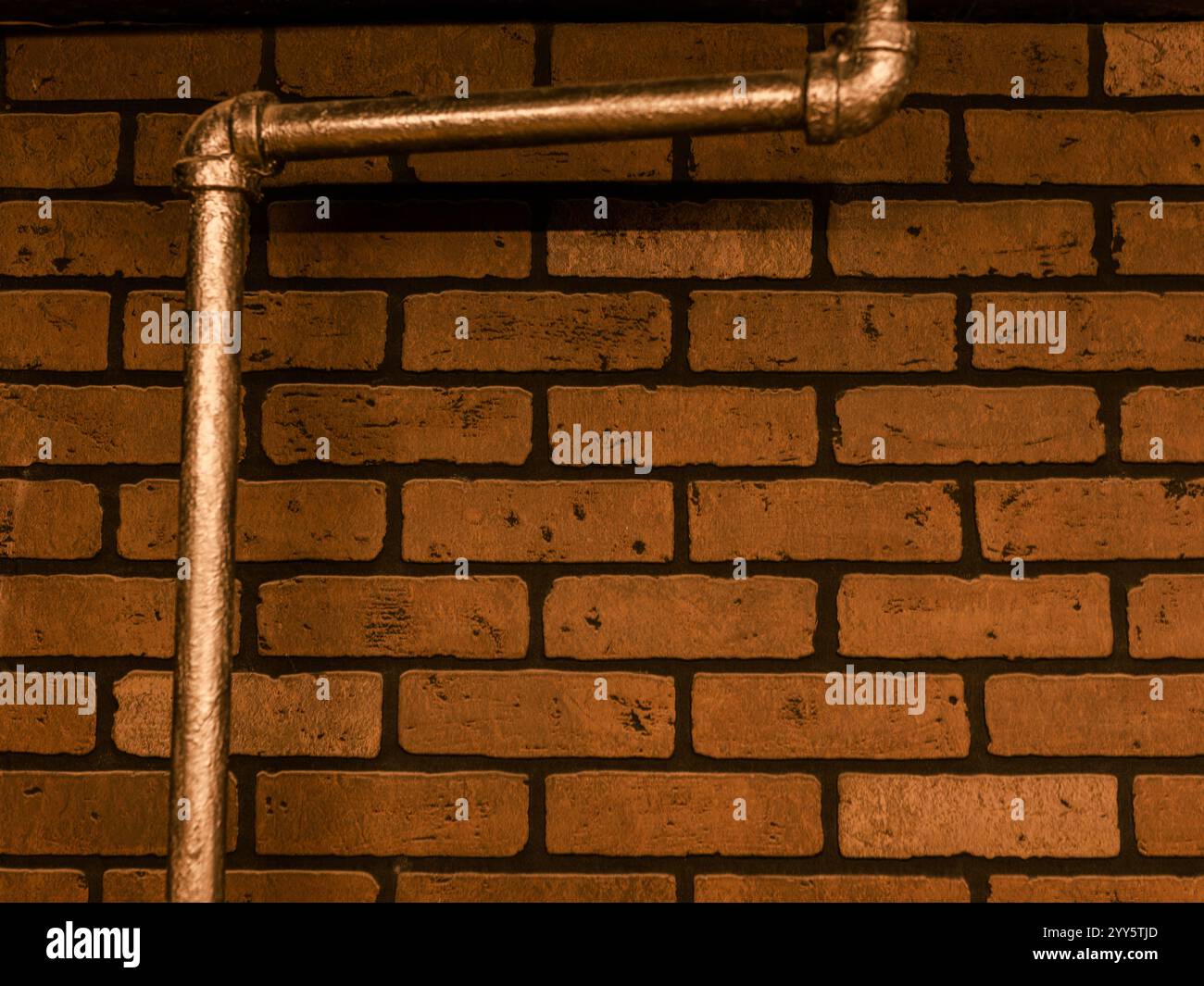 Brick Interior Facade with Copper Water Pipes Stock Photo - Alamy