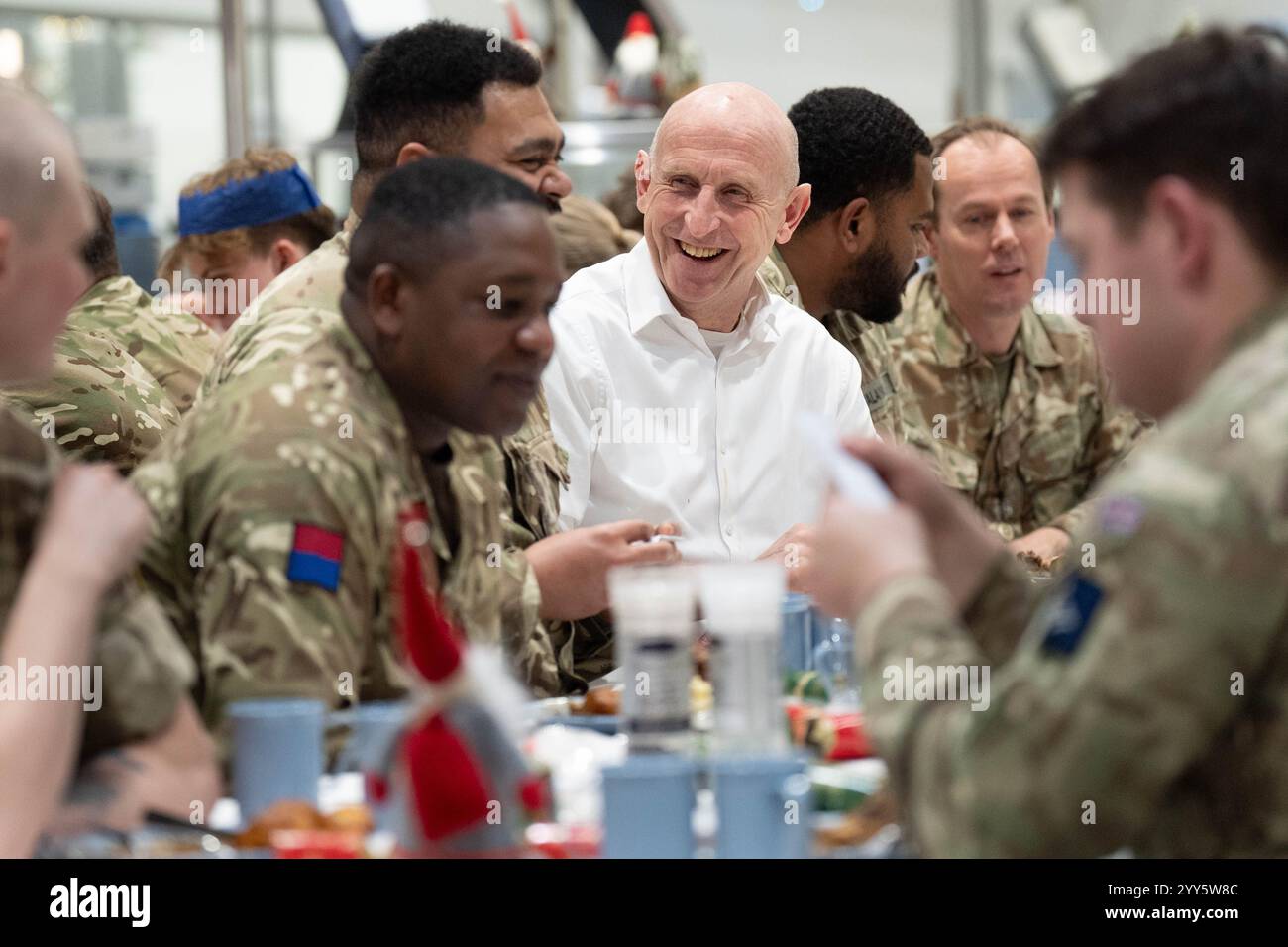 Defence Secretary John Healey enjoying Christmas lunch with British ...