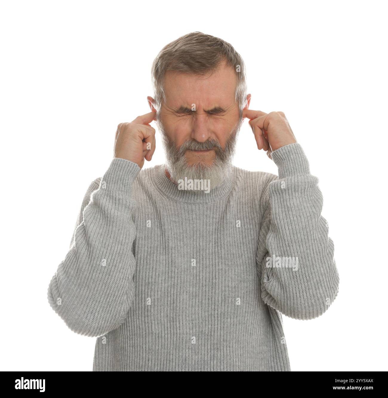 Senior man covering his ears with fingers on white background Stock ...