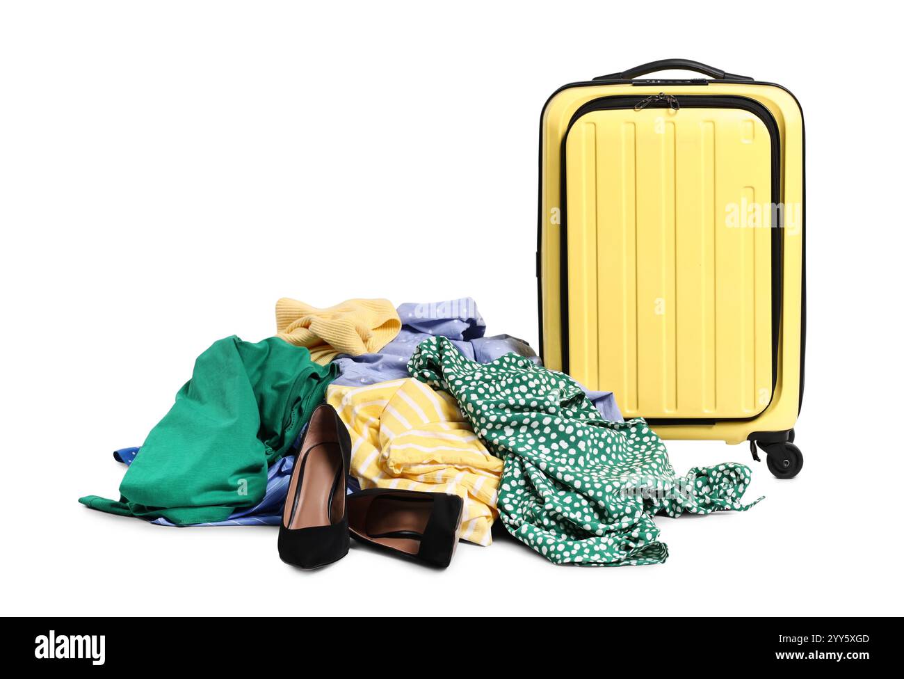 Suitcase and messy pile of clothes on grey background Stock Photo - Alamy