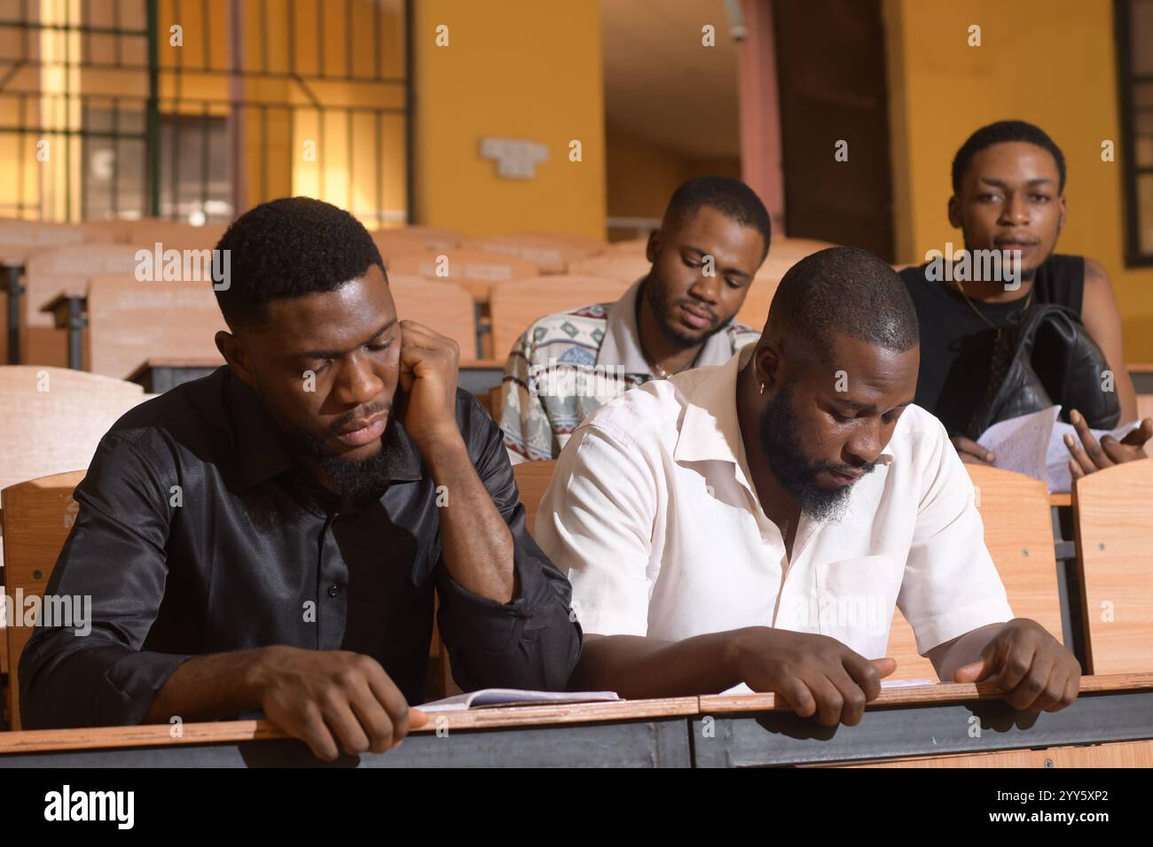group of students in the classroom reading together happily Stock Photo ...