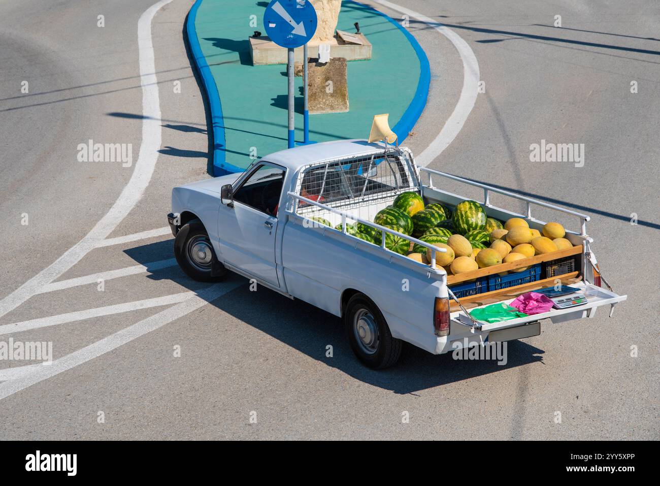 Top view of fresh fruit in white pick up truck. Ripe watermelons and ...