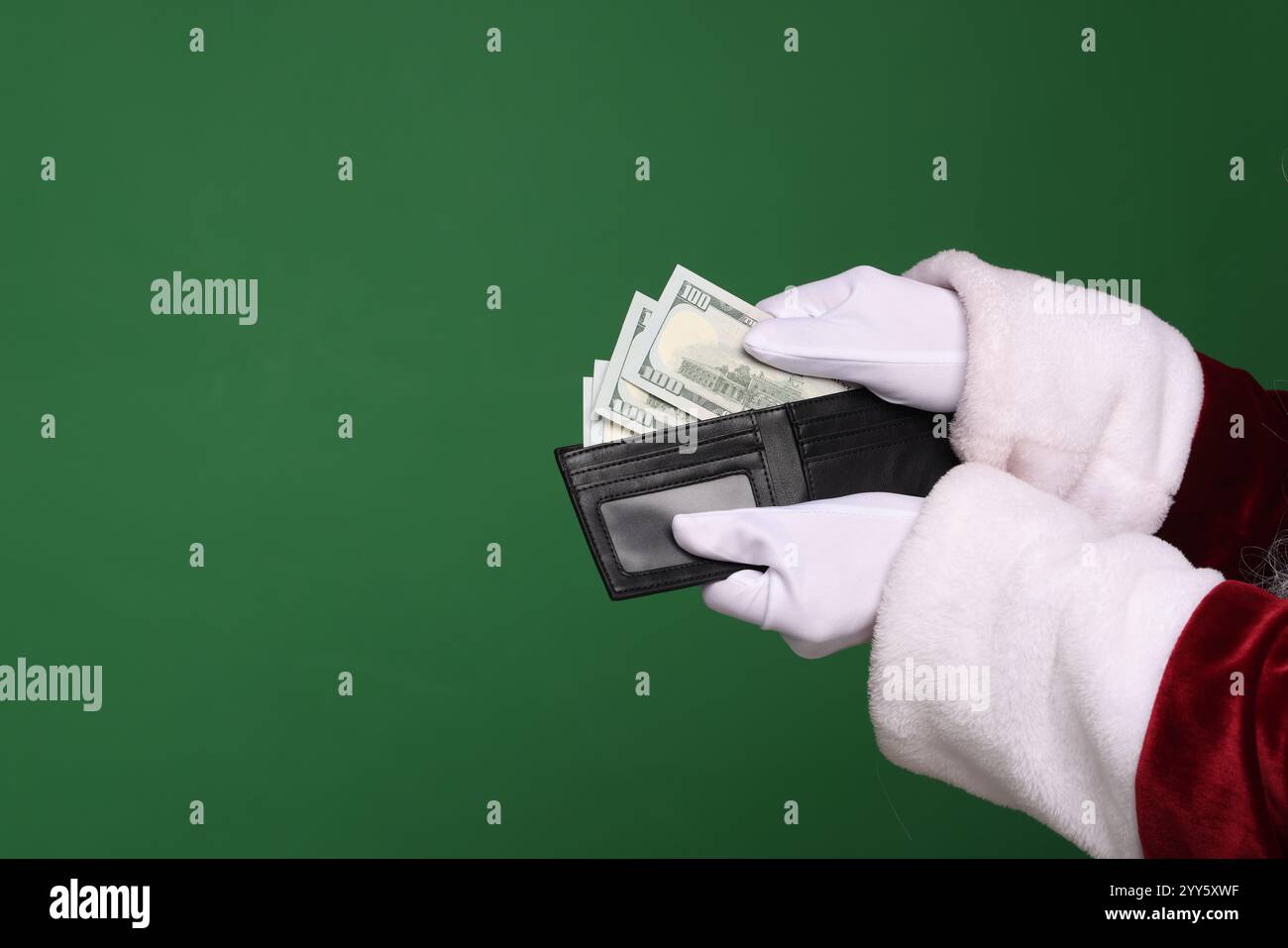 Santa Claus with dollar banknotes on green background, closeup. Space ...