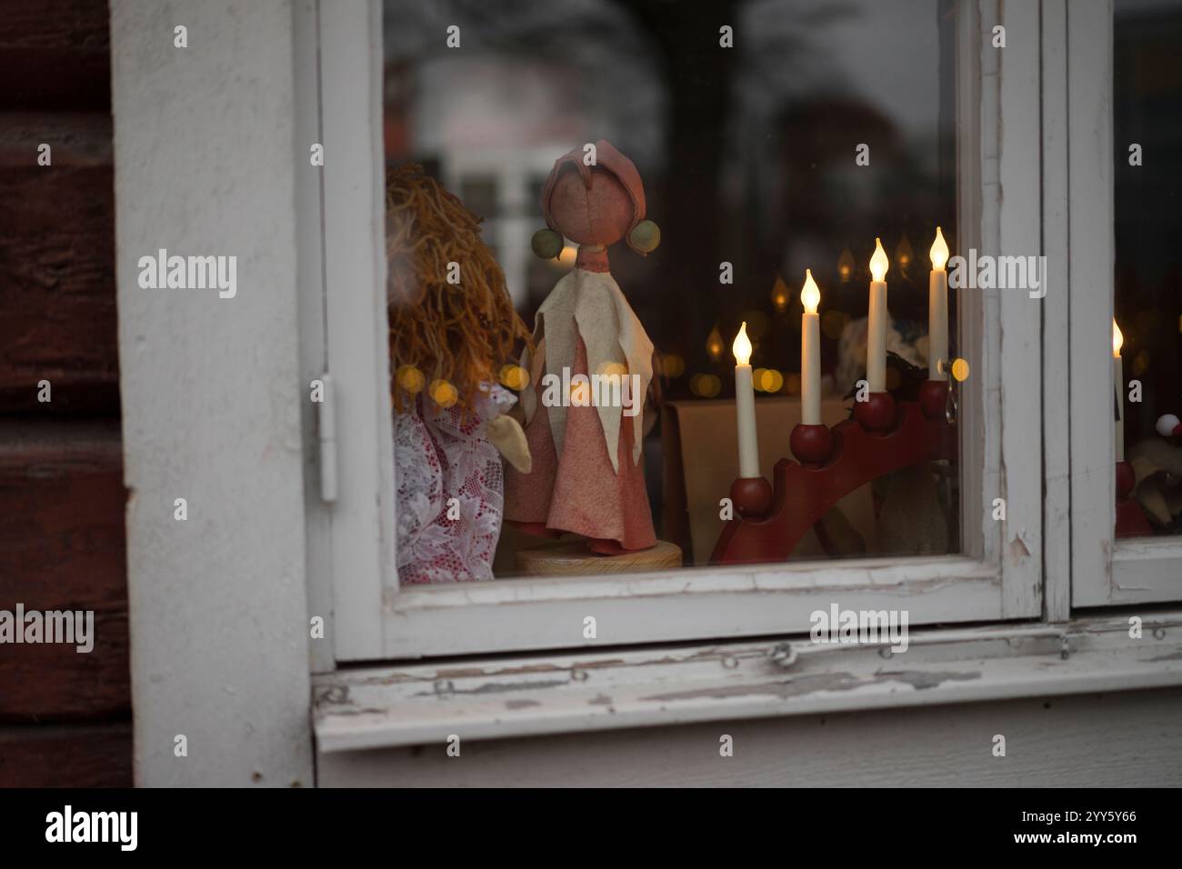 Details of a old window with christmas lights and decorations in Sweden ...