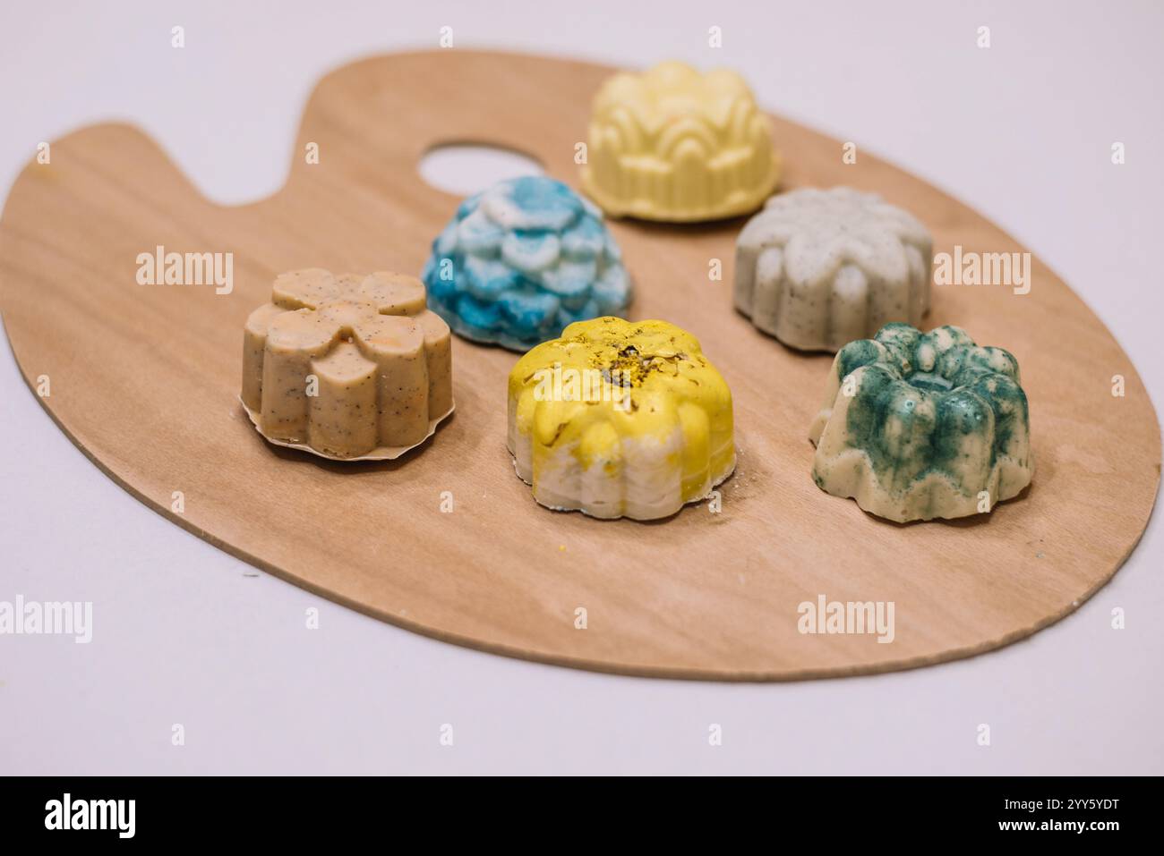 Top view of bars of beautiful, fragrant and colorful homemade soaps on ...