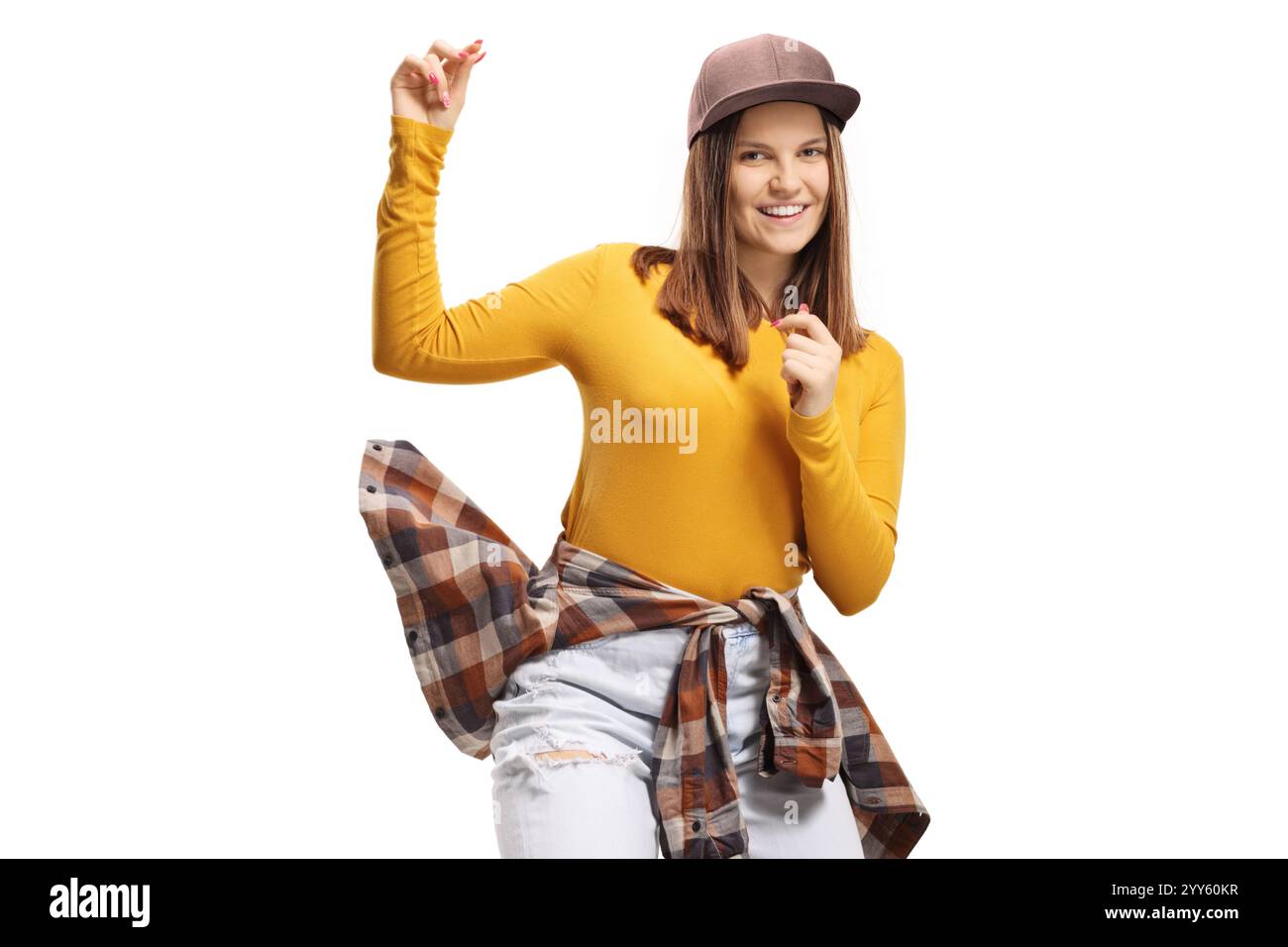 Cheerful young casual female dancing isolated on white background Stock ...