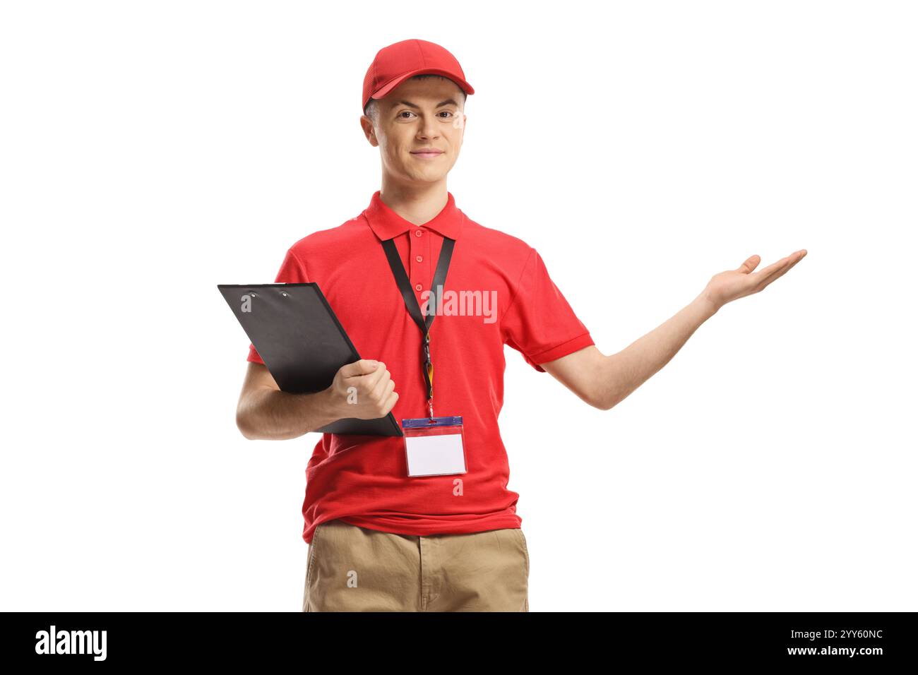 Shop assistant holding a clipboard and gesturing with hand isolated on ...