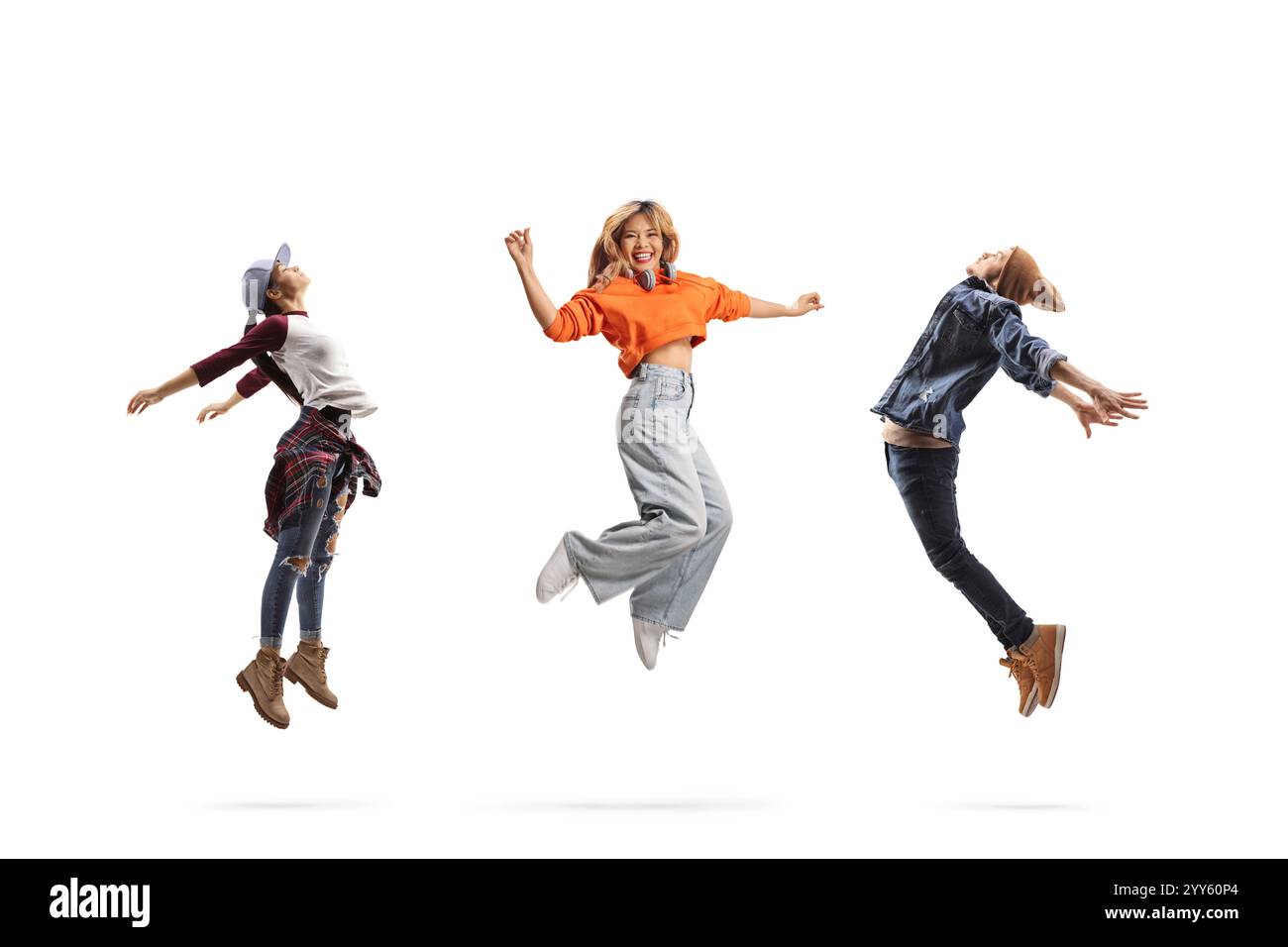 Group of young people performing a dance choreography isolated on white ...