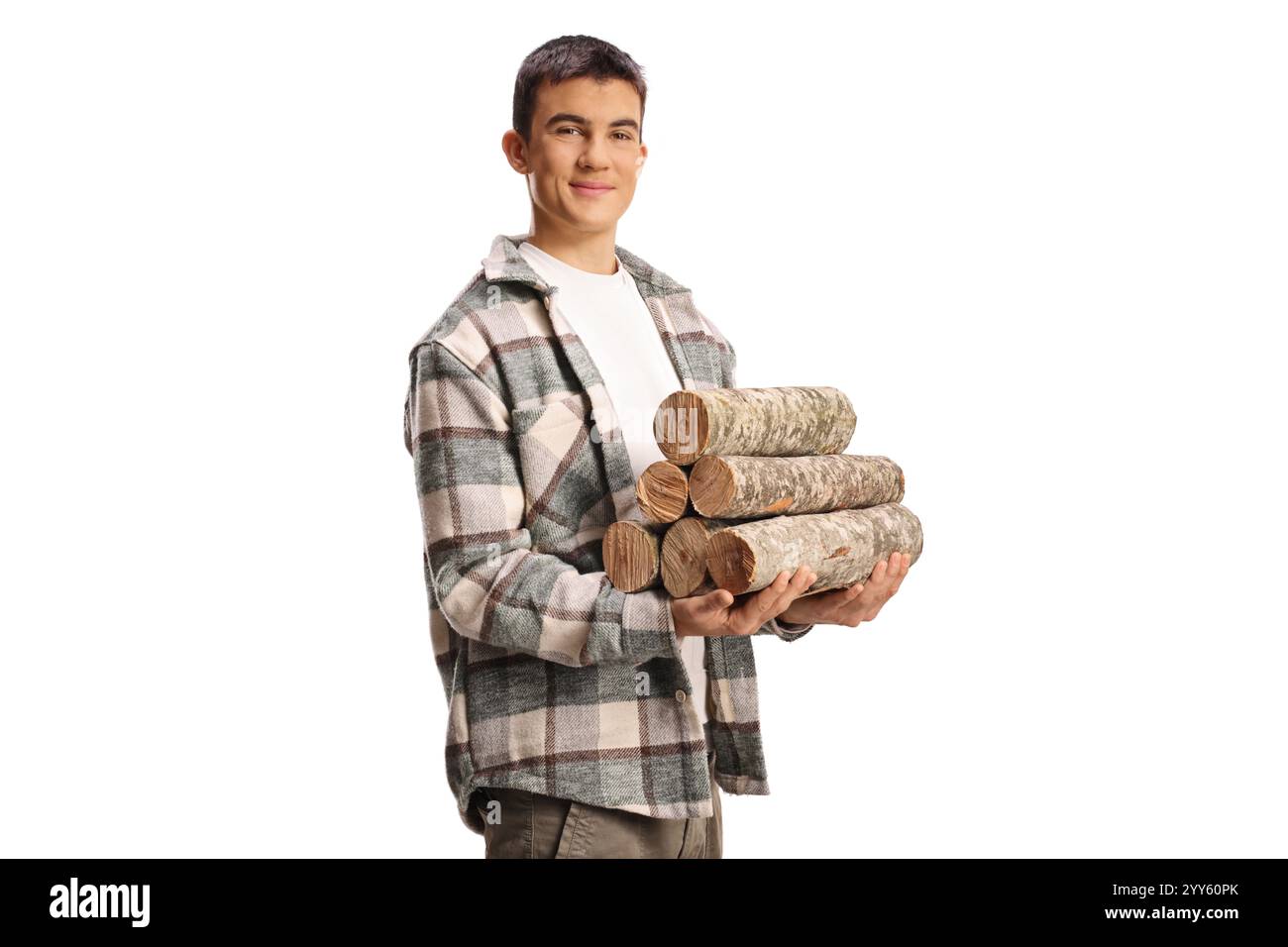 Smiling young man holding a pile of timber isolated on white background ...