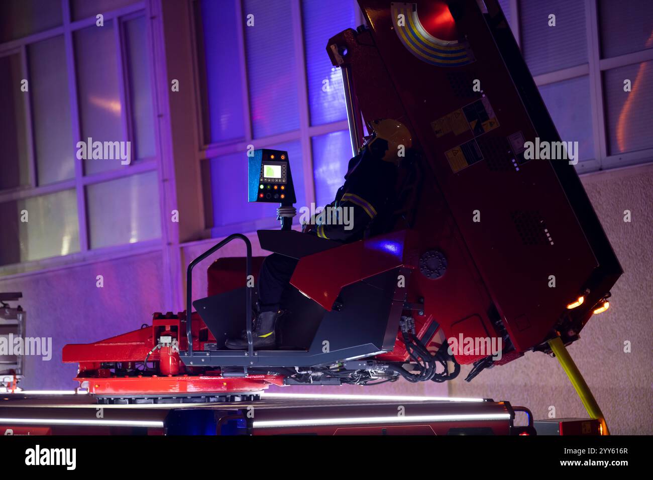 Firefighters control hydraulic firefighting basket. Control panel ...