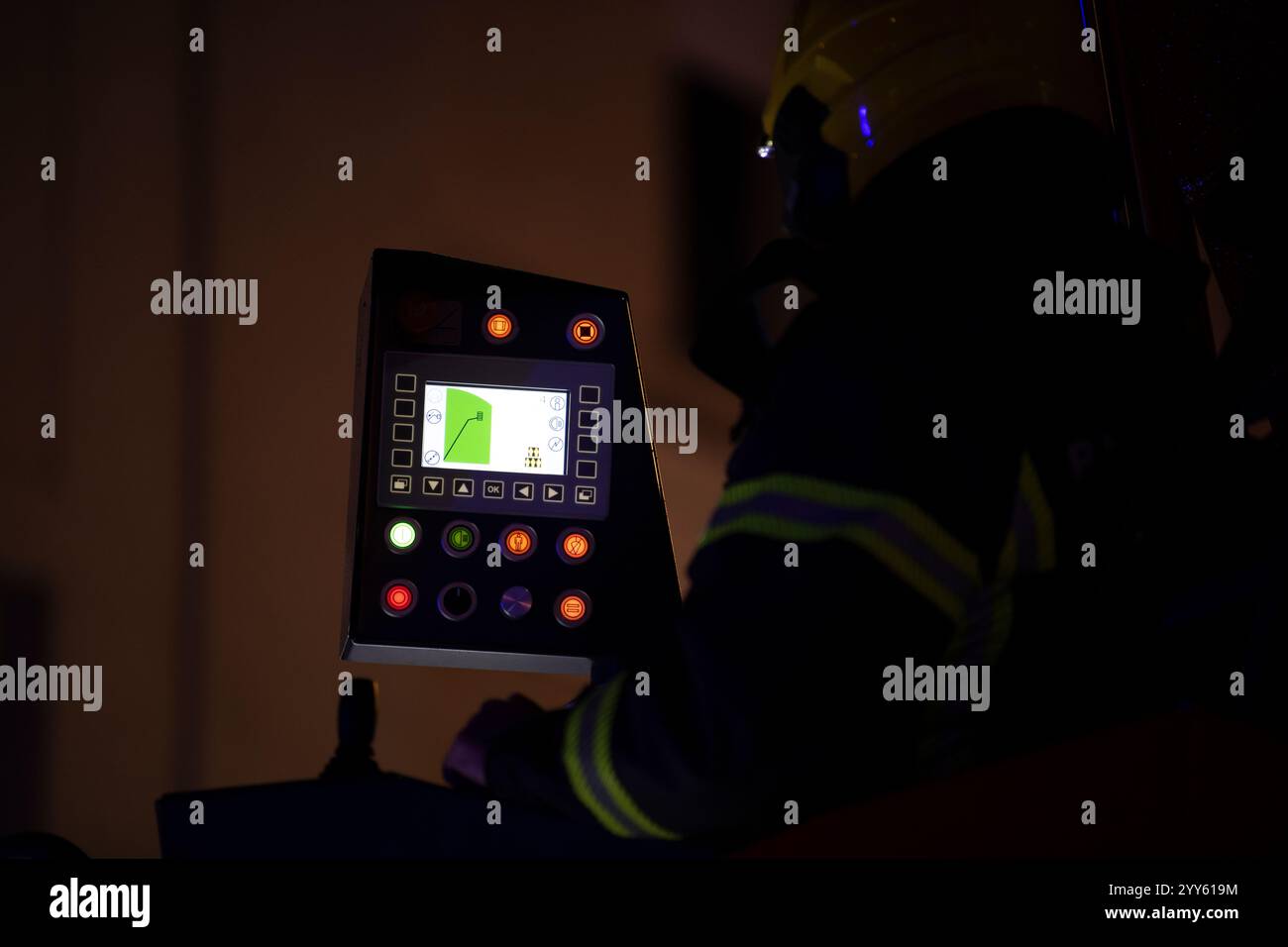 Firefighters control hydraulic firefighting basket. Control panel ...