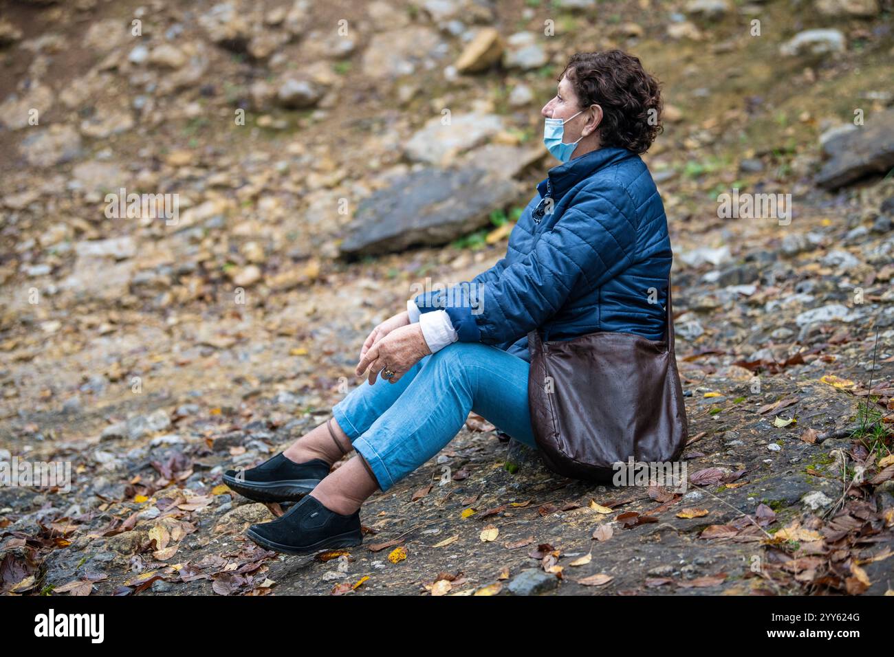 Tourists meditate and rest on stones of Pyramid of the Sun, known for ...