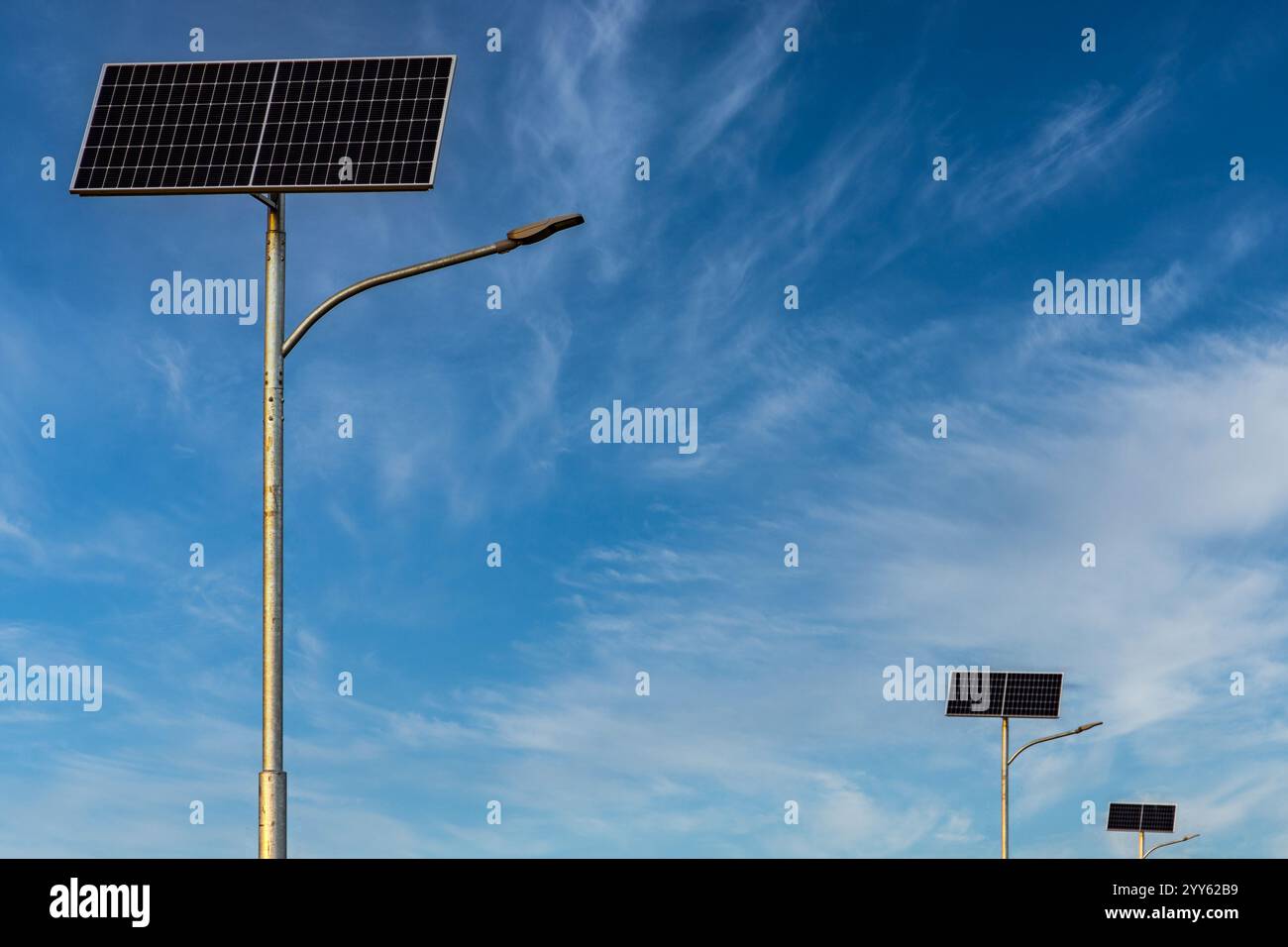 Photovoltaic panels used to illuminate the road against the sky ...
