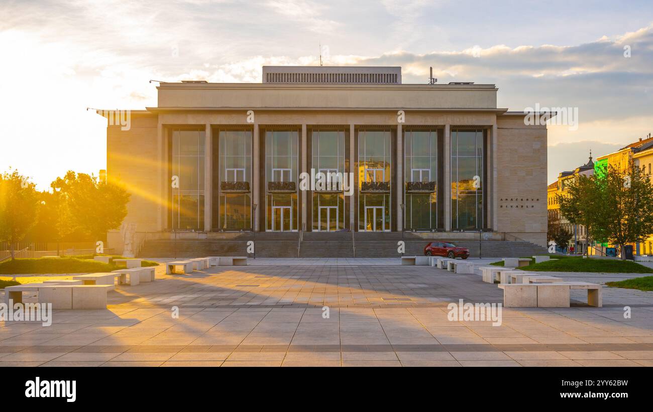 The sun rises, casting golden light on the Janacek Theatre in Brno ...