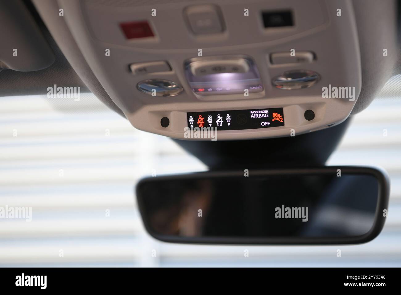 Close up of cabin car ceiling lamp, light control panel inside interior ...