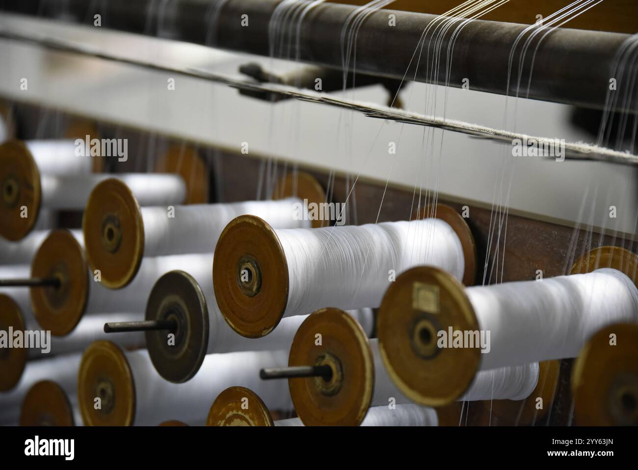 A traditional weaving workshop Factory with old manual wooden loom ...