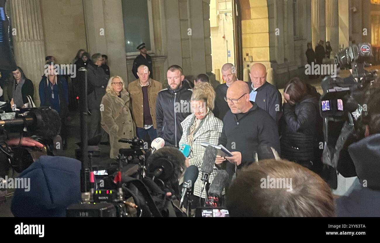 Family and police speaking to the media outside Bristol Crown Court ...