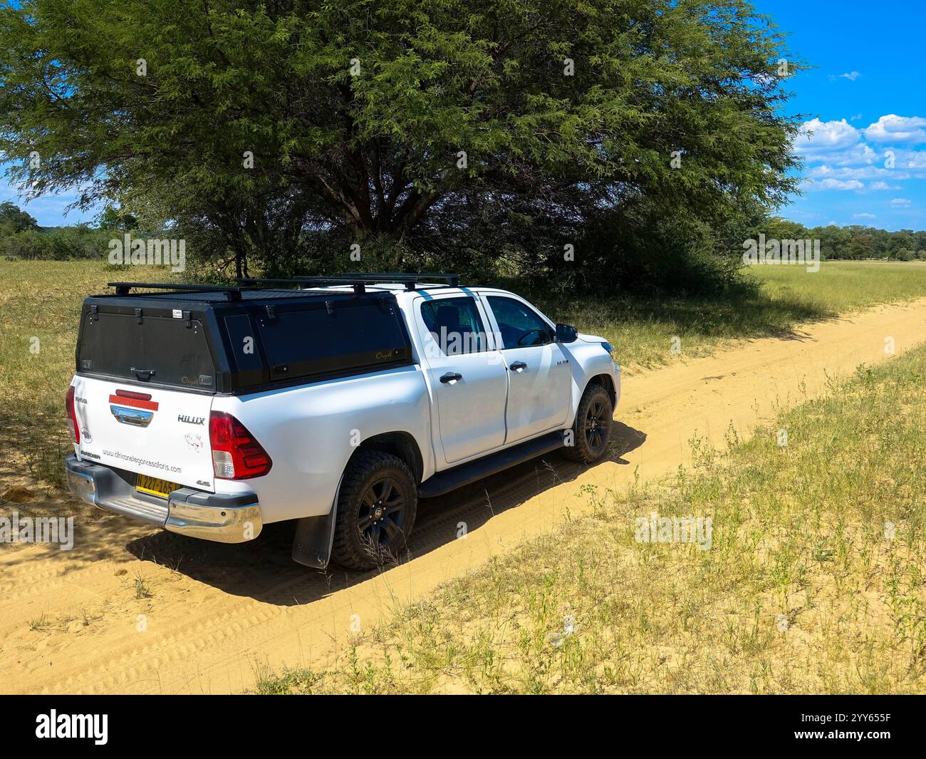 Off-road driving a rental car on a gravel road, a 4x4 track in a sandy ...